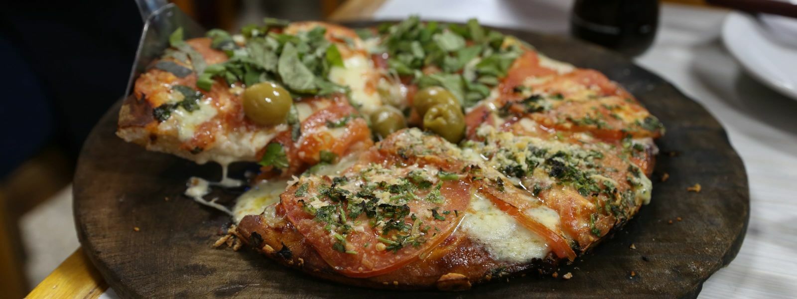 El Cuartito - conheça a tradicional pizza de Buenos Aires